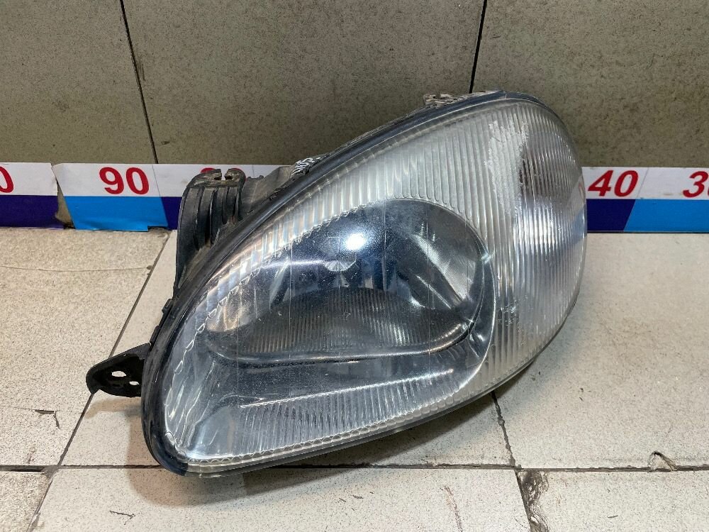 Фара левая Chevrolet Lanos 96324502
