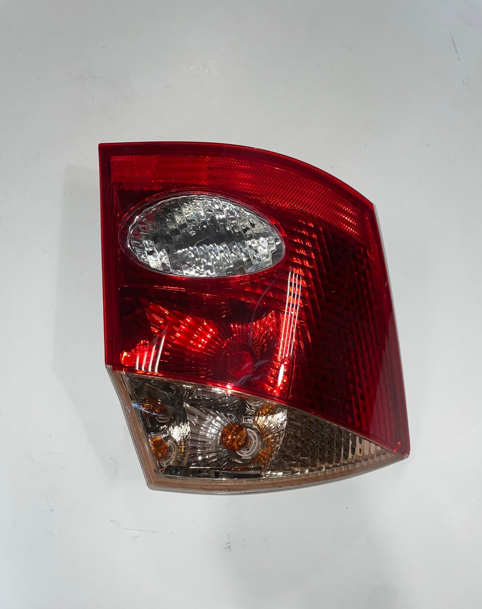 Фонарь задний левый Geely Vision [1.8 16V 5MT седан] 1067000108