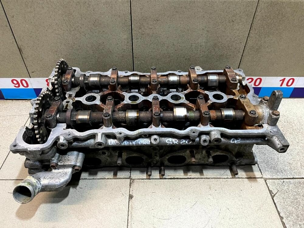 Головка блока цилиндров Nissan Liberty 110402J200