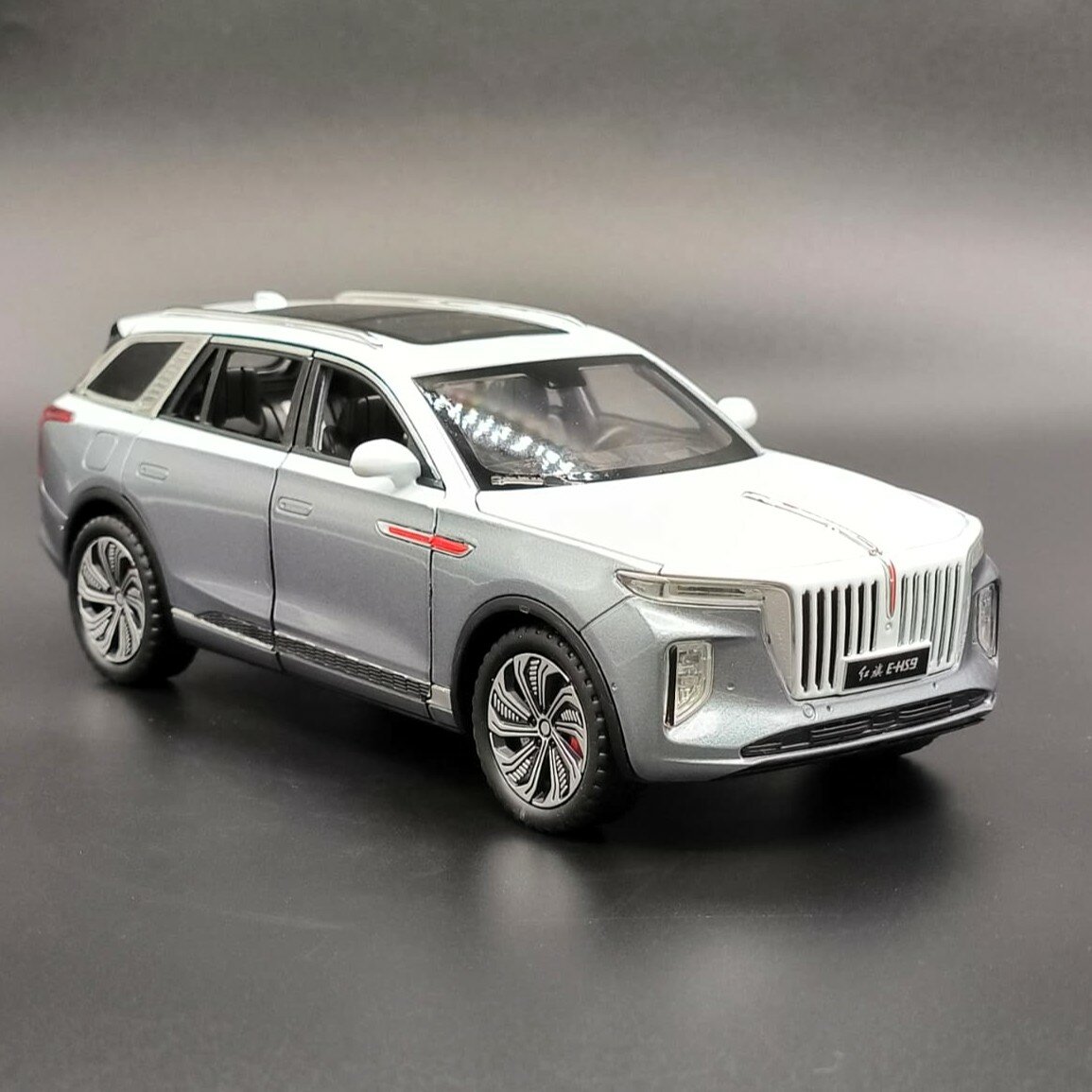 Машина металлическая Hongqi EHS9 (Хончи И-ЭйчЭс9) с инерционным механизмом и свето-звуковым сопровождением. Масштаб 1:24