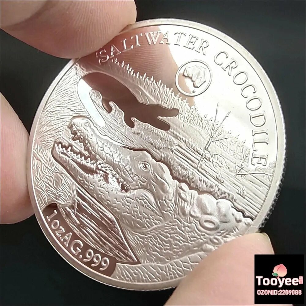 Сувенирная монета из морского крокодила Соломоновых островов номиналом 1 доллар