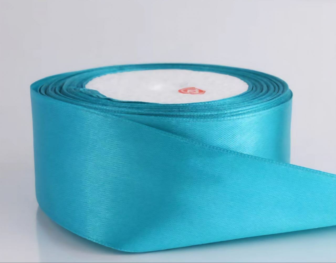 Лента атласная. Ширина 4 см, длина 22 метра. Цвет светло синий