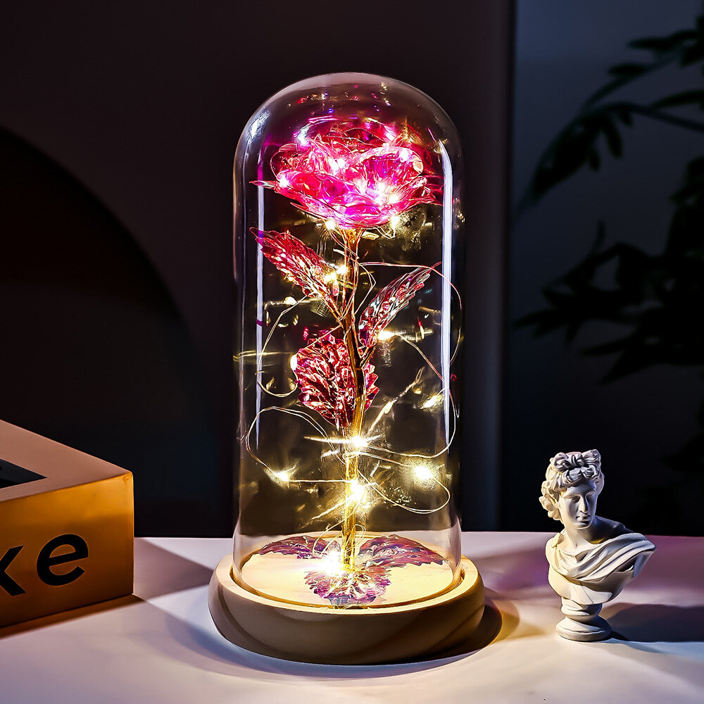 Ночник "цветет вечно" в колбе на батарейках - это готовый подарок для девушки в защитном чехле.