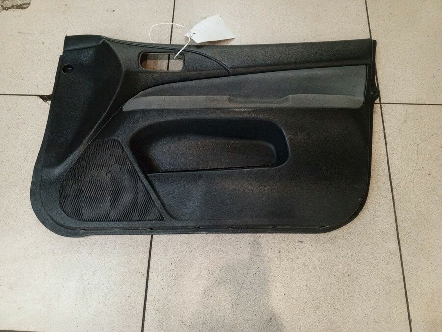 Обшивка двери передней правой от Mitsubishi Lancer 9 CS 2000-2008
