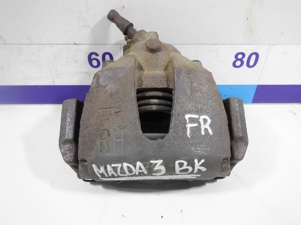 Суппорт передний правый Mazda 3 BK