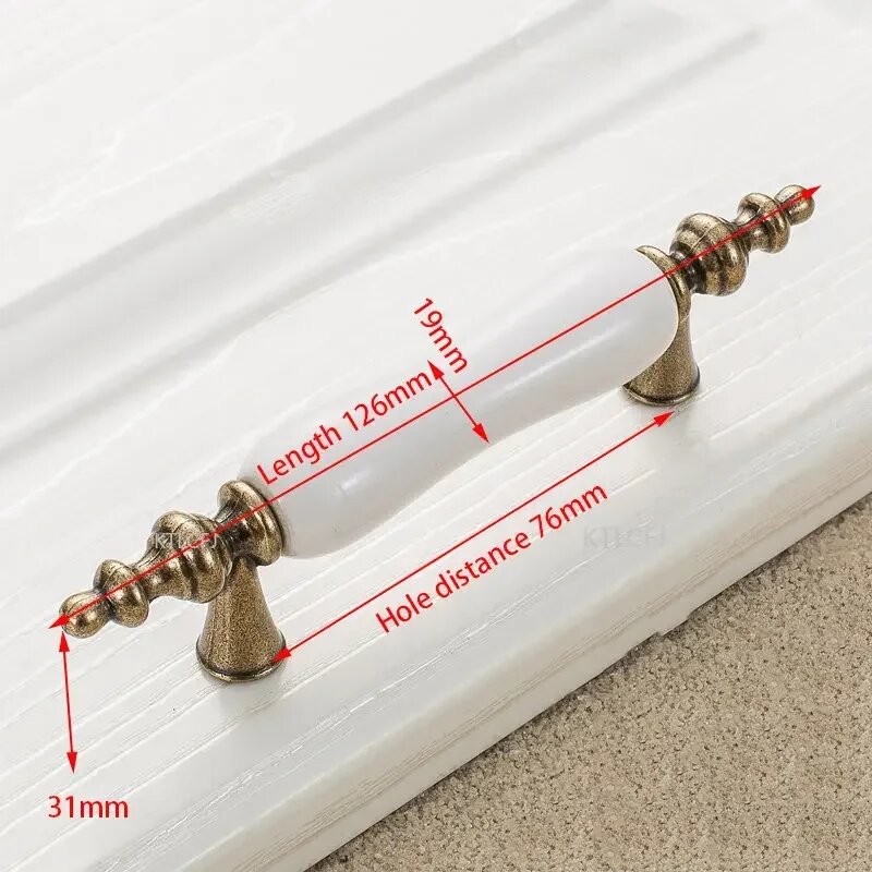 Керамические ручки для шкафов античная бронза 1006-76