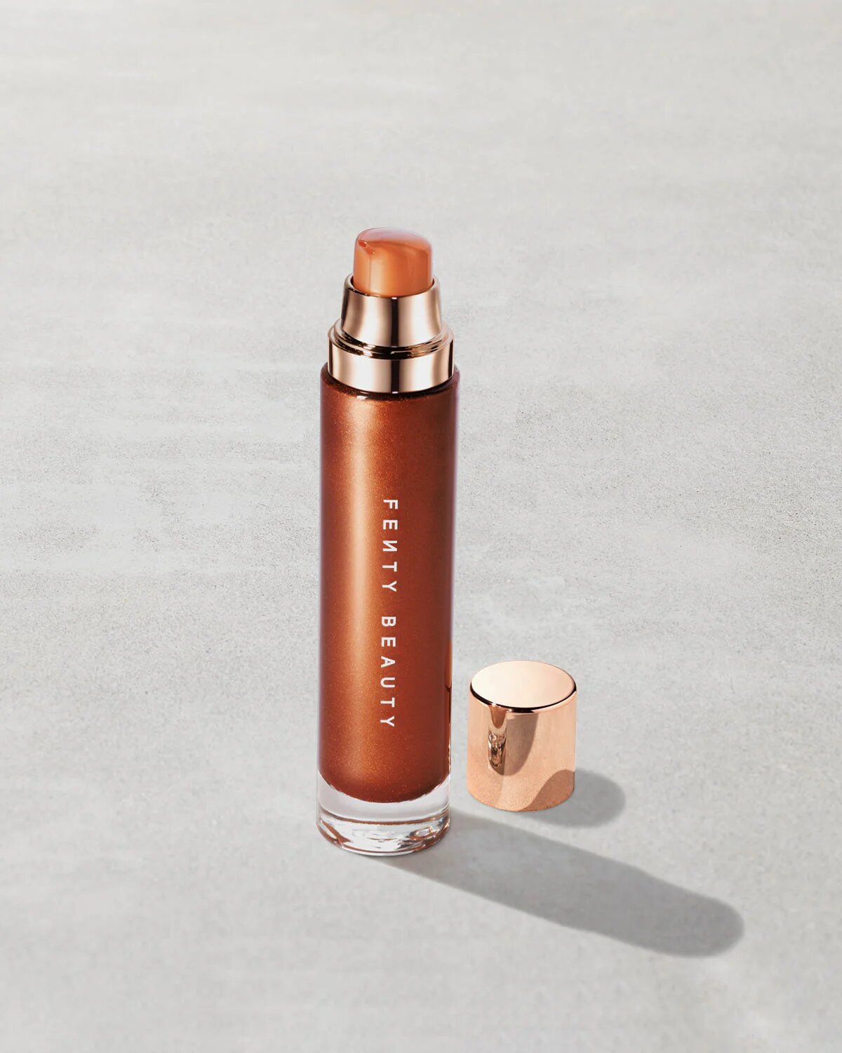 FENTY Beauty гель-шиммер для тела с влажным блеском Body Lava Body Luminizer, Penny Drop