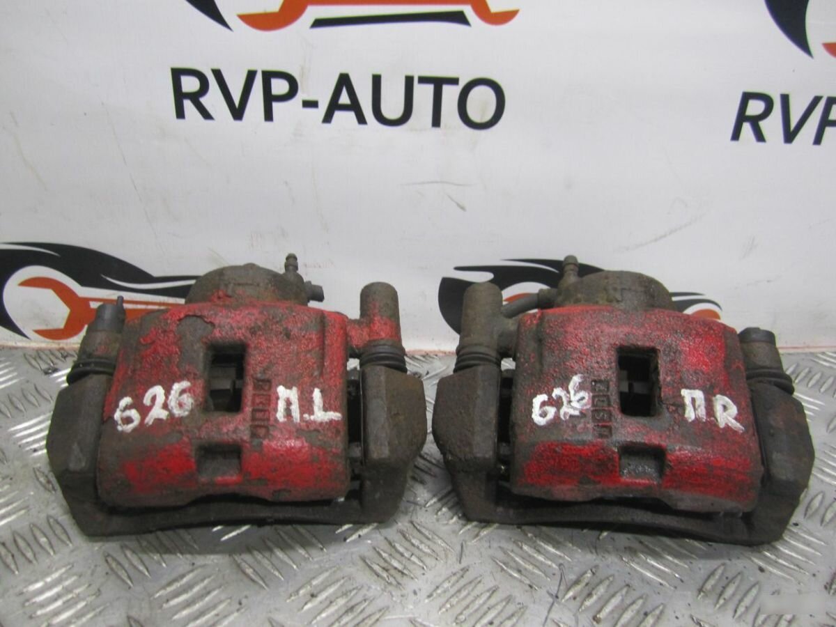 Суппорт тормозной передний Mazda 626 GE 1992-1997