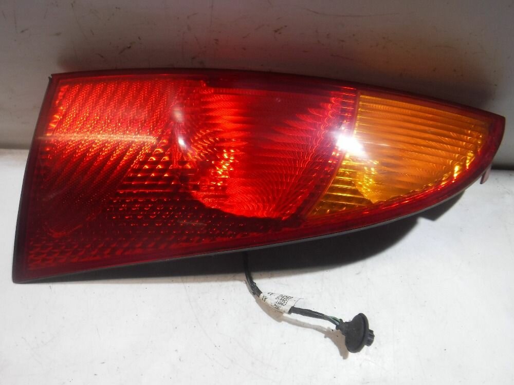 Фонарь задний левый Ford Focus I 1S4Z13405AA