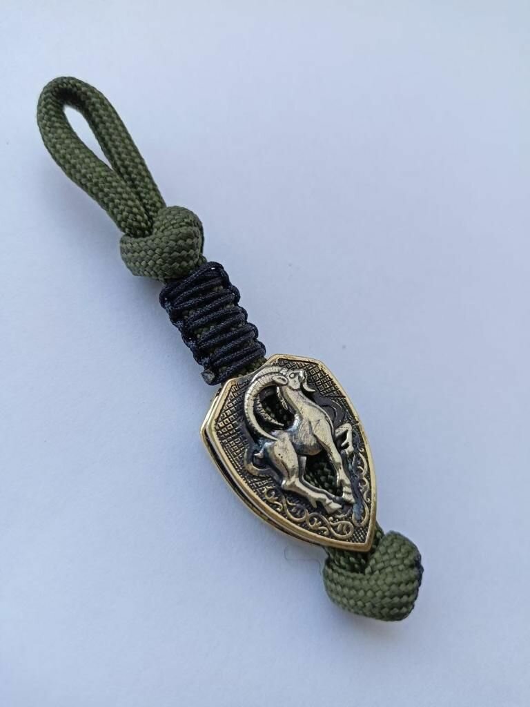 Темляк с бронзовой бусиной Козерог