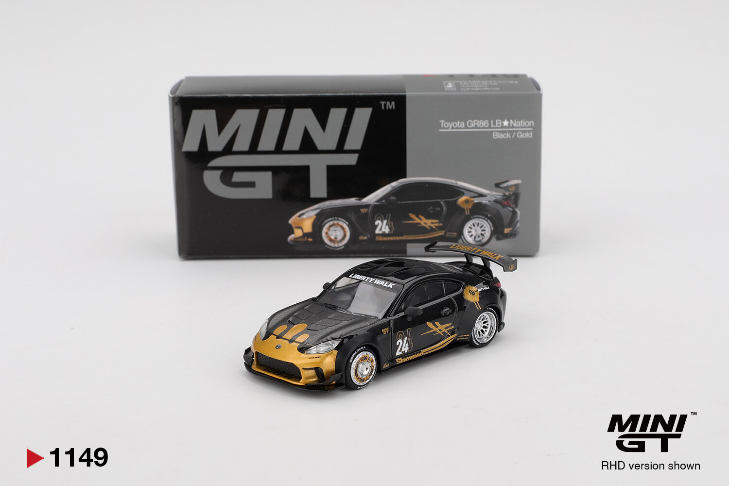 Коллекционная машинка MINI GT 1:64 Toyota GR86 LBNation Black Gold