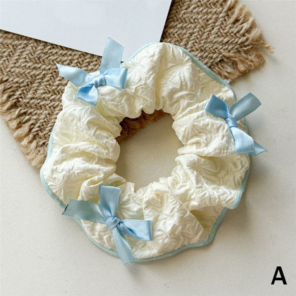 Кремово-желтая повязка на голову с бантом