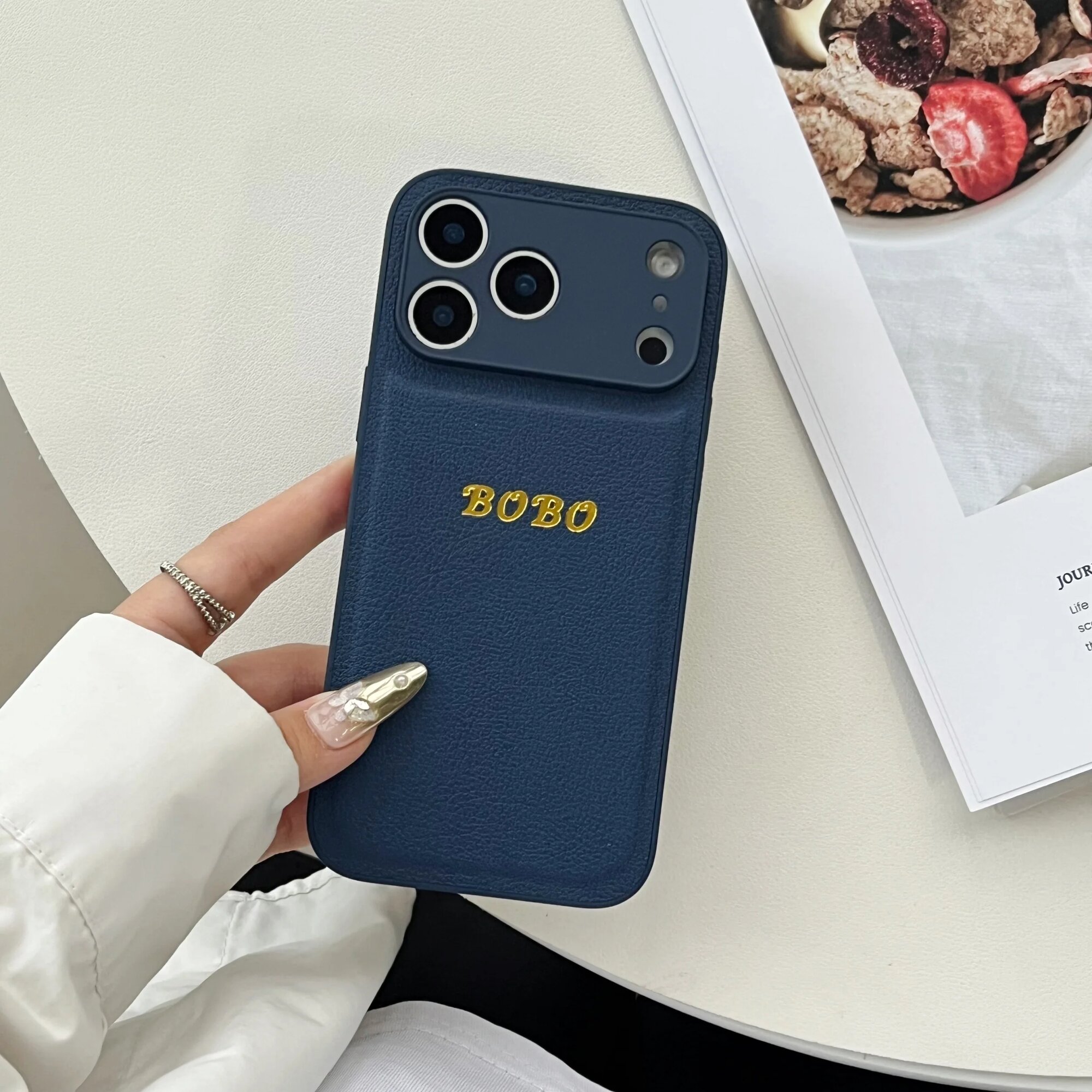 Чехол для iPhone 15 синий с тиснением "BOBO"