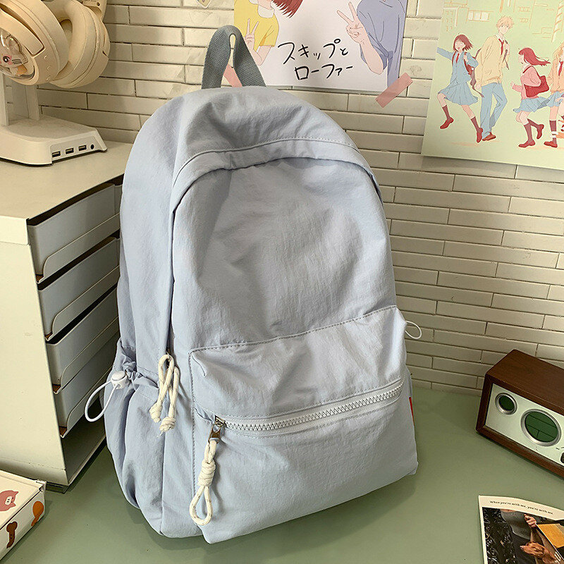 Trendy nylon school bag with reinforced stitching and air cushion straps for college or travel blue