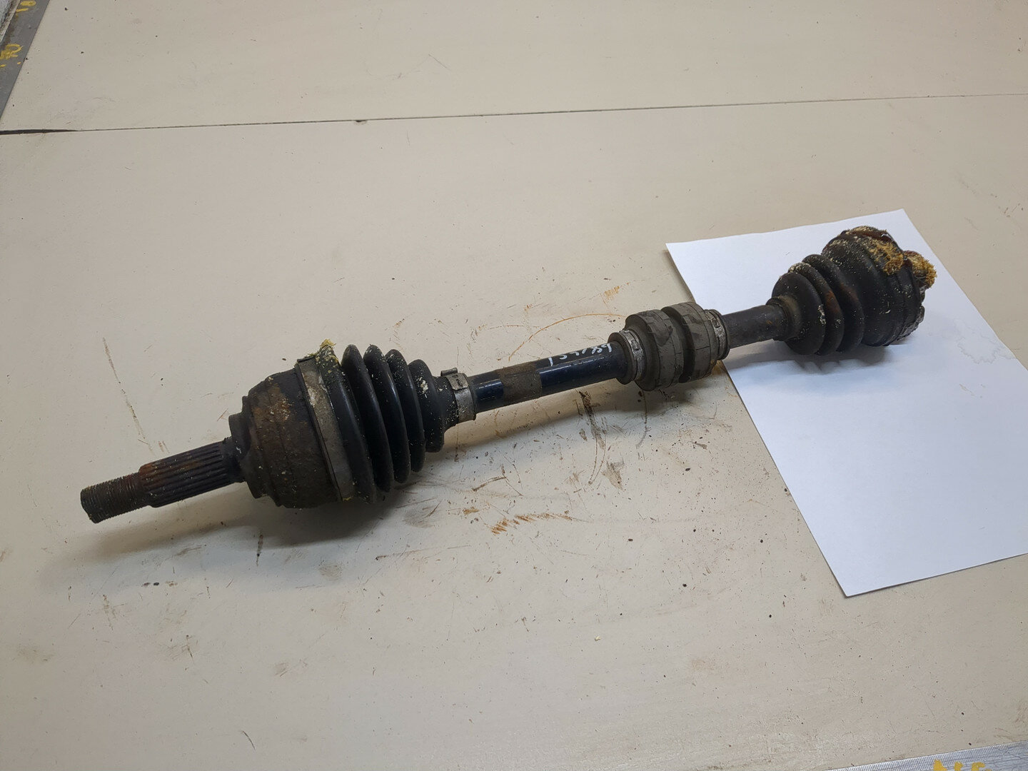 Полуось (вал, шрус) левая передняя Nissan Note E11 Б/У