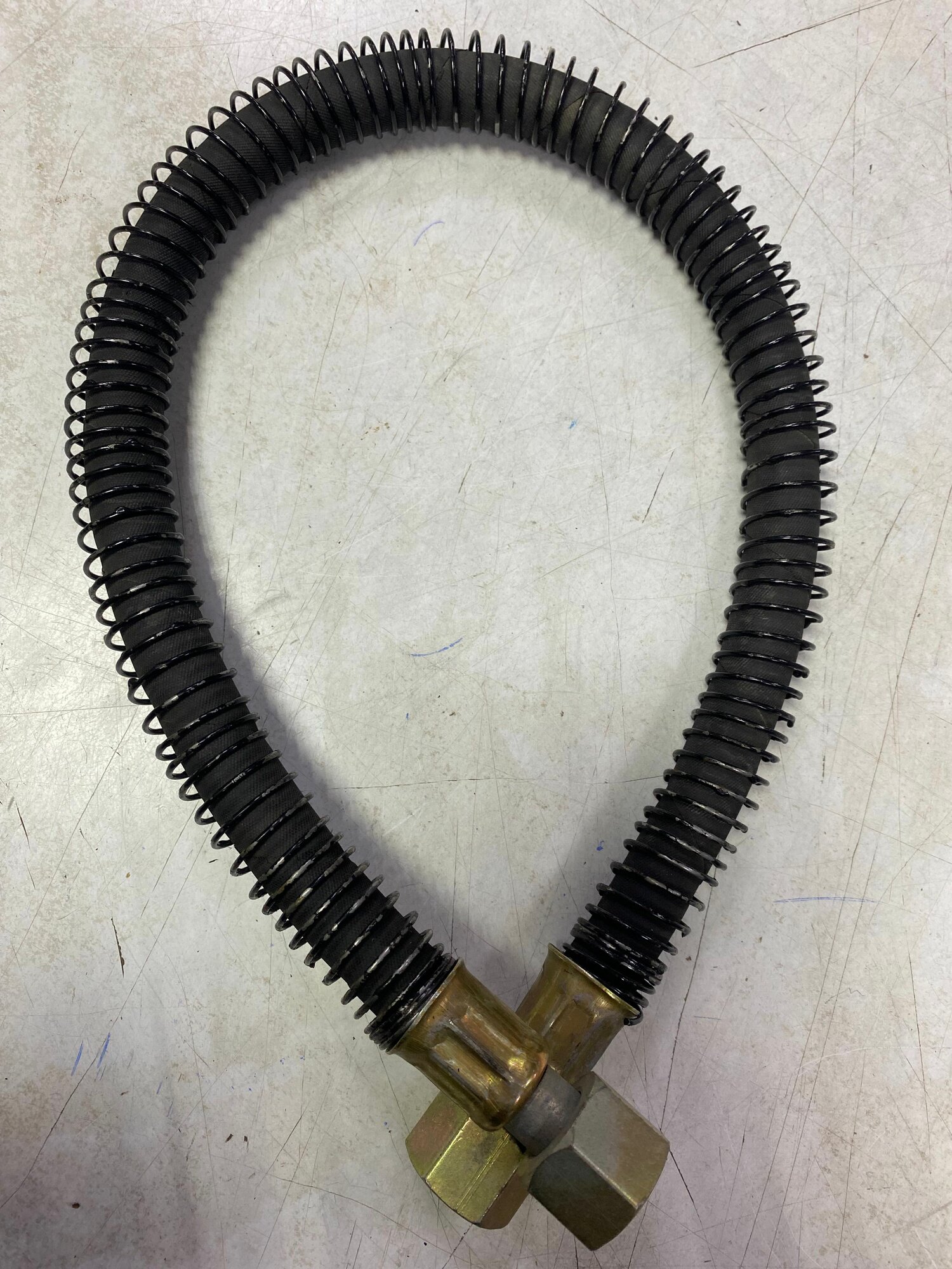 Шланг тормозной МАЗ 715мм гайка M 22*1.5 гайка M 22*1.5 в оплетке