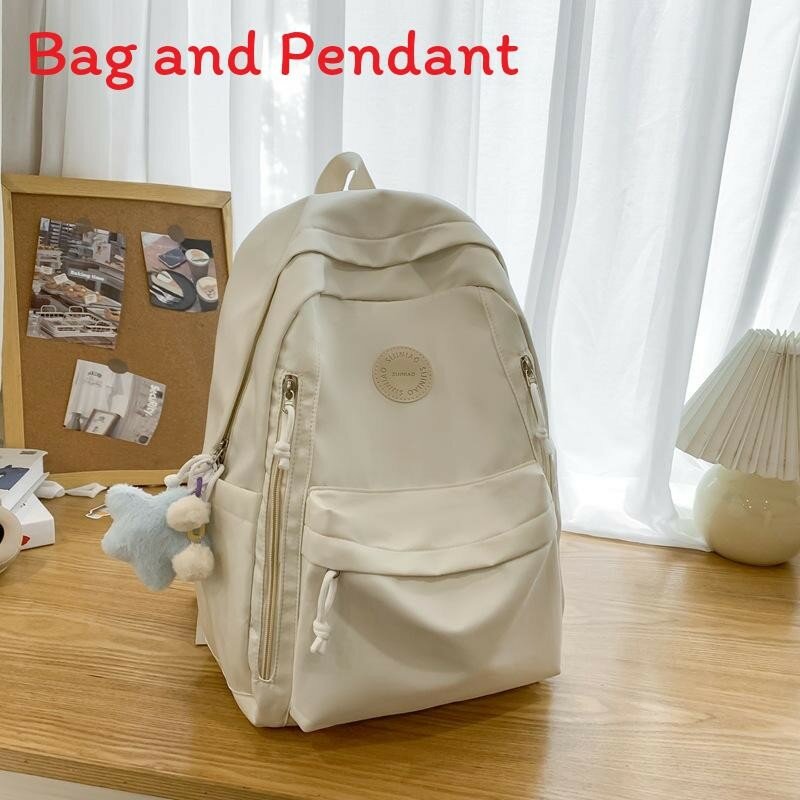 Student backpack simple solid color with plush pendant for school and leisure, white