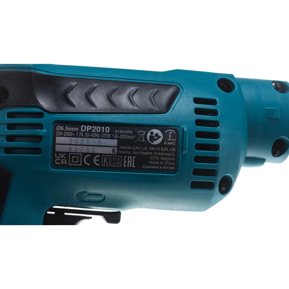 Дрель Makita DP2010 с реверсивным режимом, щеточным двигателем и ключевым патроном, профессиональный для мягких — фото 1