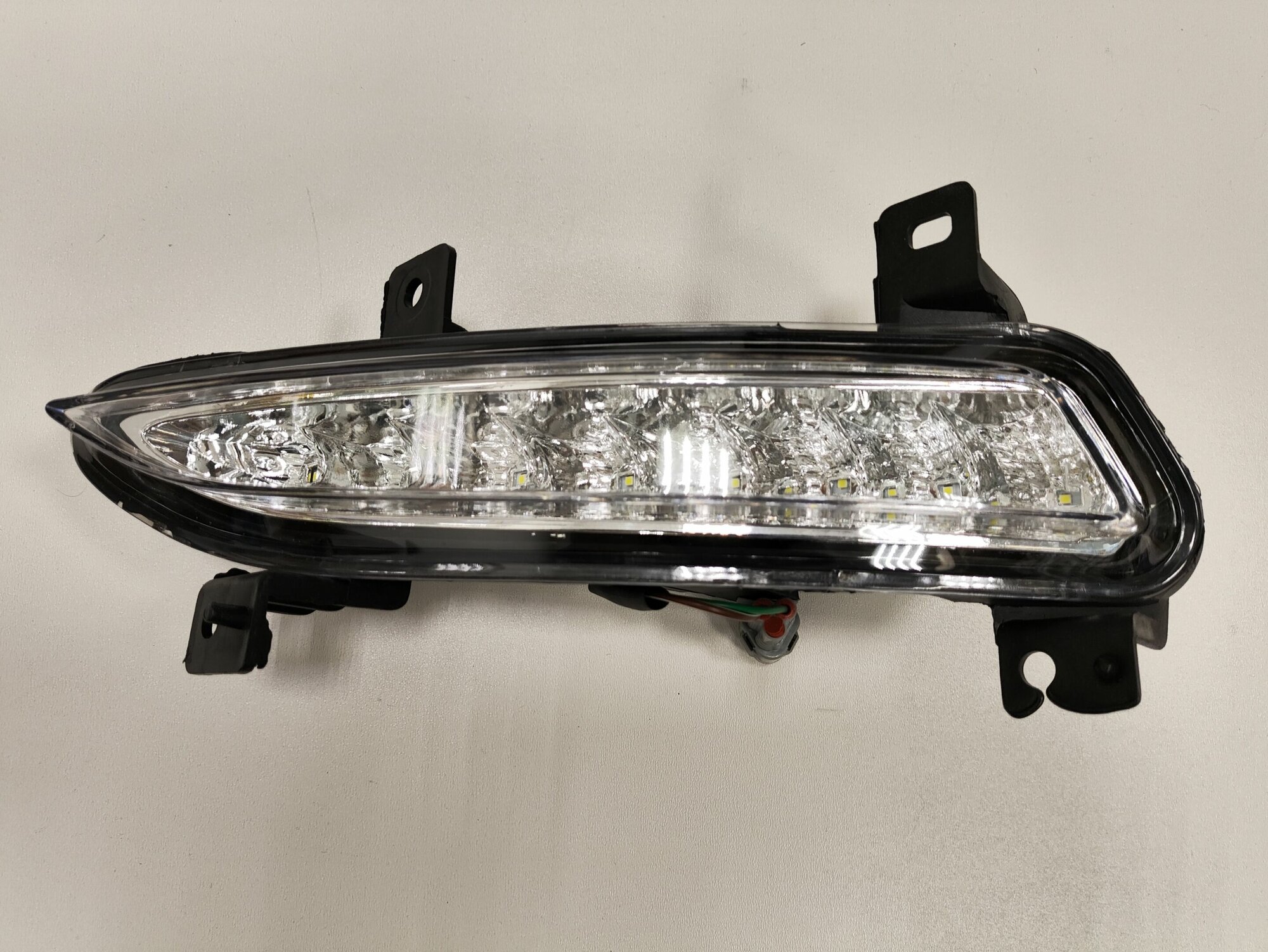 Фара противотуманная левая Geely Emgrand 7 (2016-2018) [1.5 16V 5MT седан] 1067004885