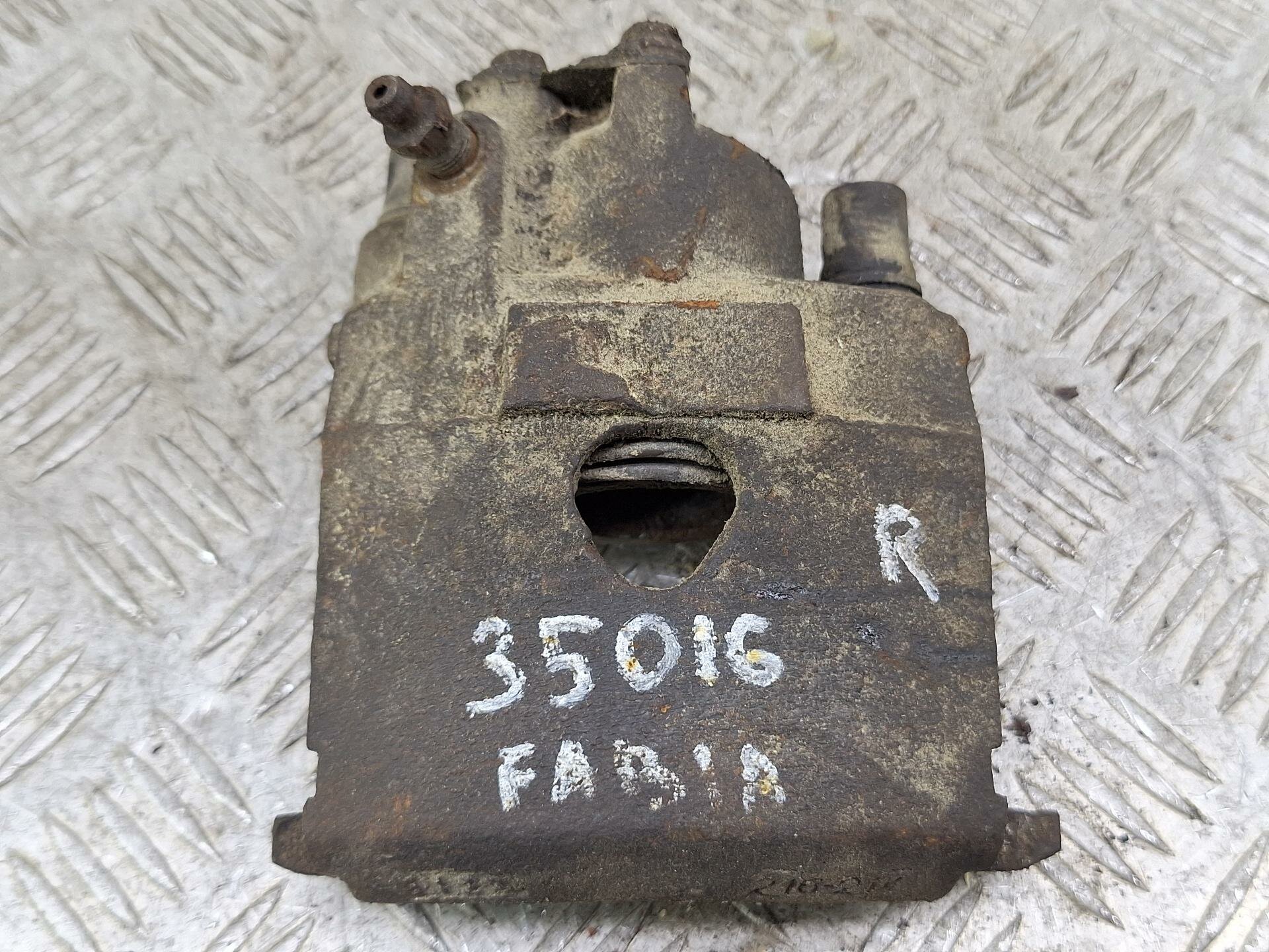 Суппорт тормозной передний правый Skoda Fabia рест. 2006