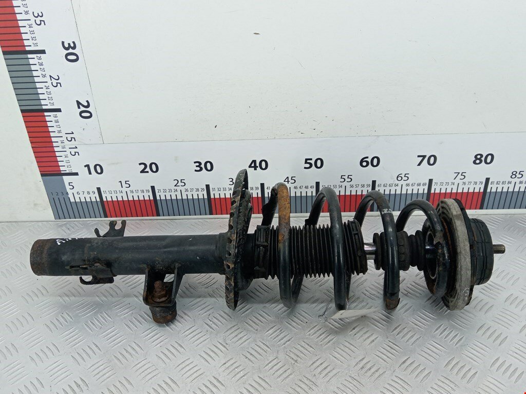 Стойка амортизатора переднего левого Volkswagen Transporter (T5) 7E5413031H арт. 1922608