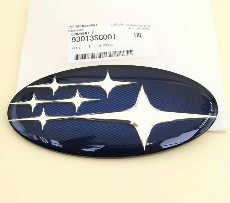 Эмблема на решетку радиатора Subaru Forester SH 08-12 SUBARU 93013SC001 140*67мм
