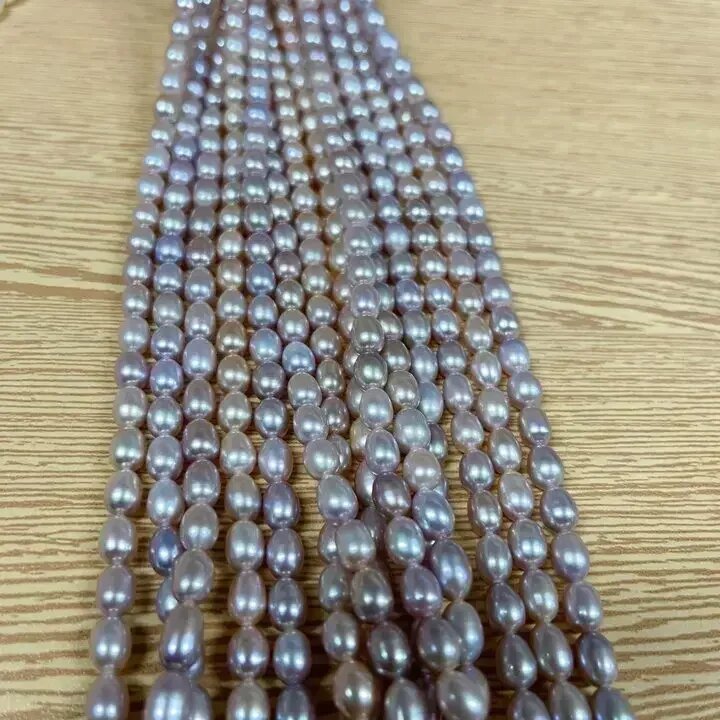 Фиолетовые натуральные пресноводные жемчужины рис 5-6 мм лавандовый