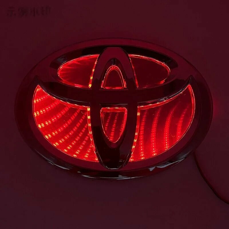 Шильдик эмблема Тойота светящаяся 3D для автомобилей Toyota 120*80mm