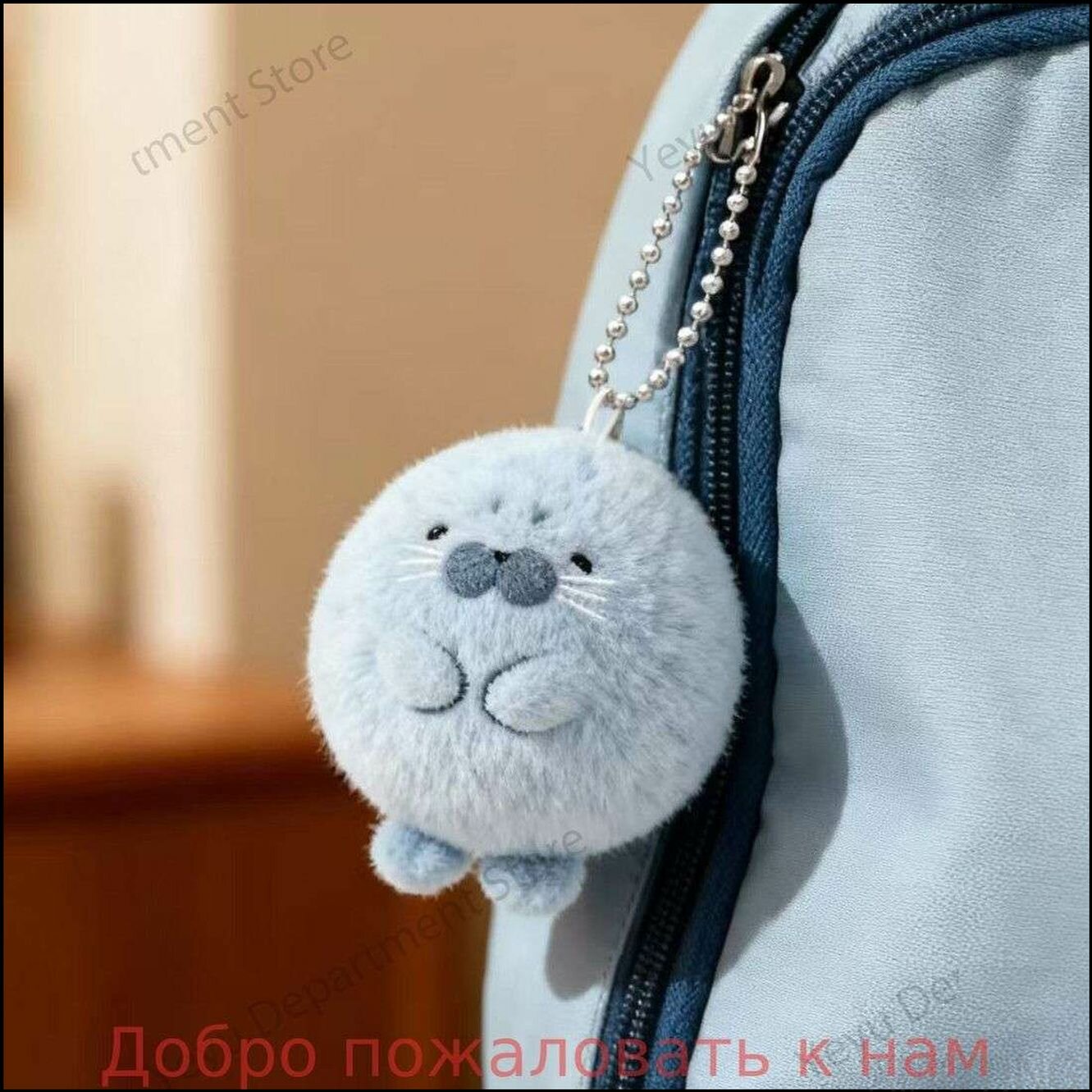 Супер милая плюшевая игрушка в форме тюленя, которую можно использовать в качестве подвески для школьной сумки