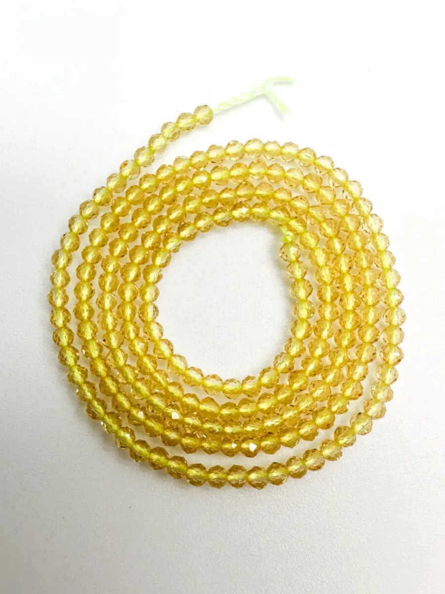 0723 Камни природные граненые бледно-желтые 2 мм 1 нить люкс