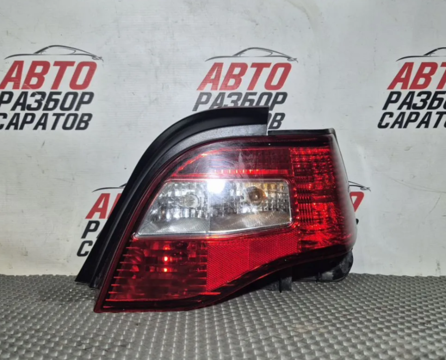 Фонарь правый Daewoo Nexia n150 оригинал E3150021