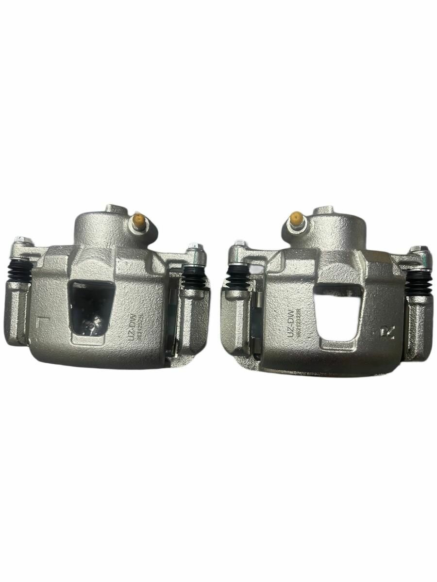 Тормозной суппорт в сборе (комплект)левый и правый на Daewoo Nexia DOHC (UZ-DW)