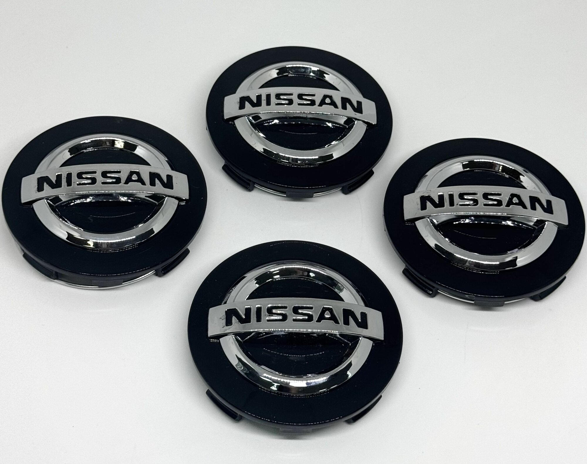 Колпачки на литые диски Nissan (Ниссан), 85 мм, черные
