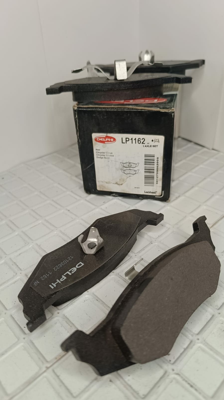 Колодки тормозные дисковые DELPHI LP1162 (05011631AA / 05012651AA / 05012651AA)задние, комплект CHRYSLER DODGE PLYMOUTH