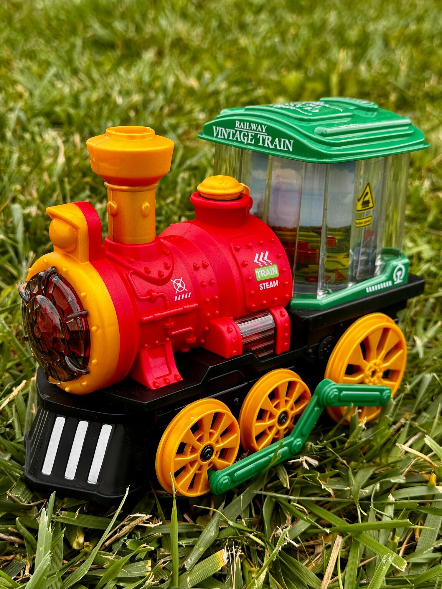 Паровозик с паром подсветкой и музыкой/ Музыкальная интерактивная игрушка на колесиках