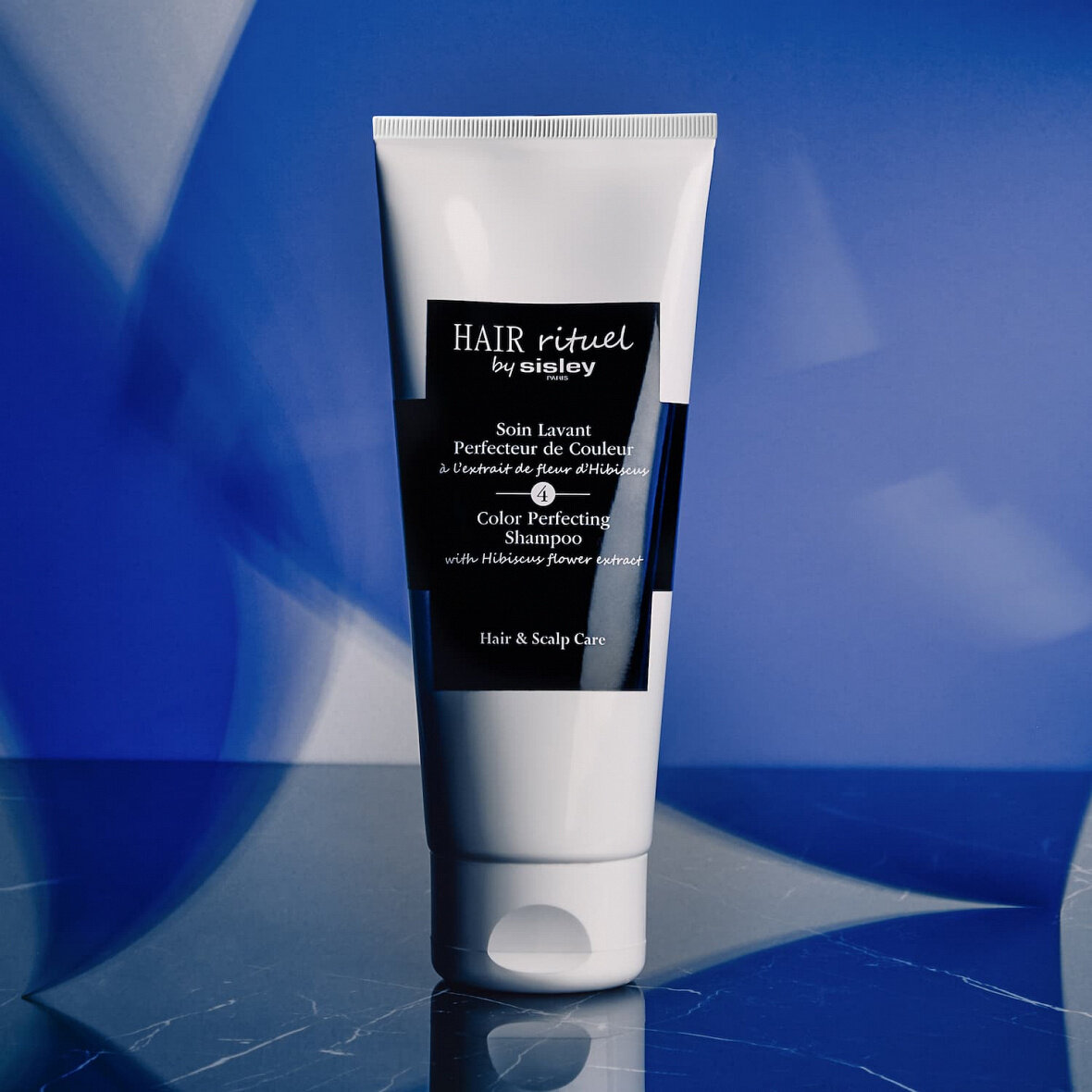 Шампунь для окрашенных волос с экстрактом гибискуса Hair Rituel by Sisley Color Perfecting Shampoo