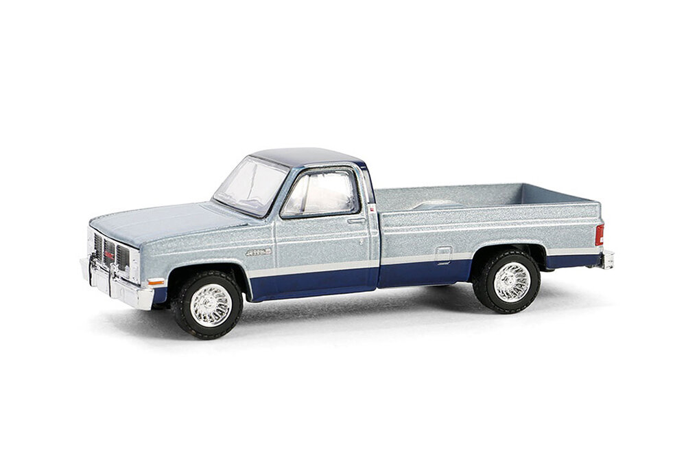 Модель коллекционная GREENLIGHT Gmc sierra classic K2500 пикап 1985 silver/midnight blue (длина модели 6-10 см)