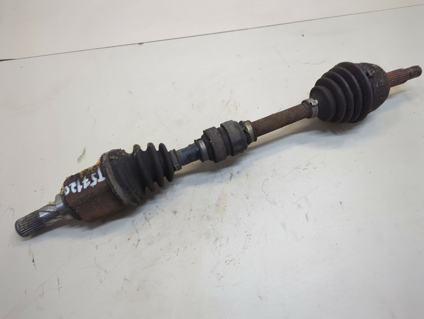 Полуось (вал, шрус) левая передняя Nissan Note E11 Б/У