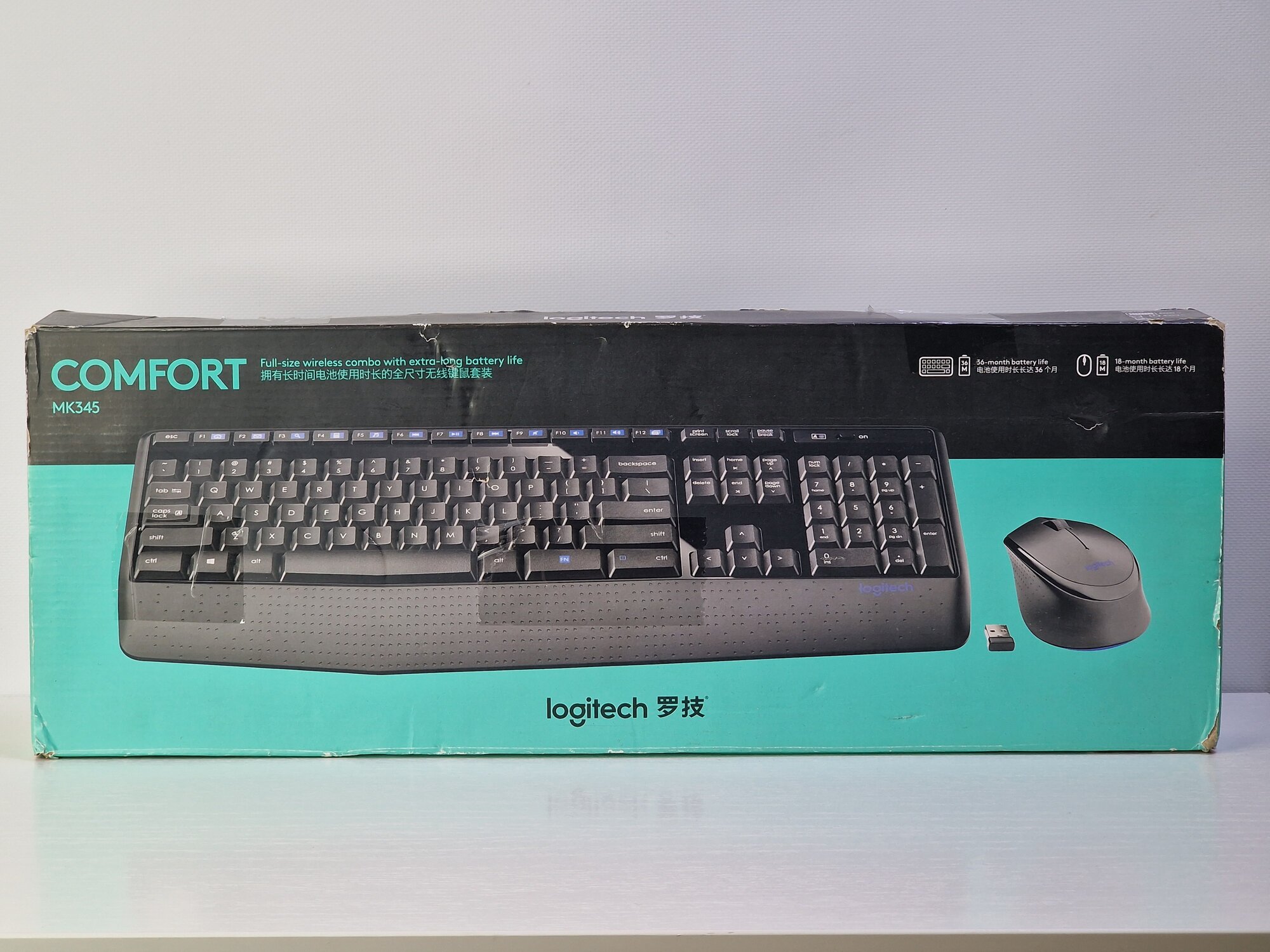 Комплект клавиатура + мышь Logitech Wireless Combo MK345 Comfort, синий/черный, английская/русская