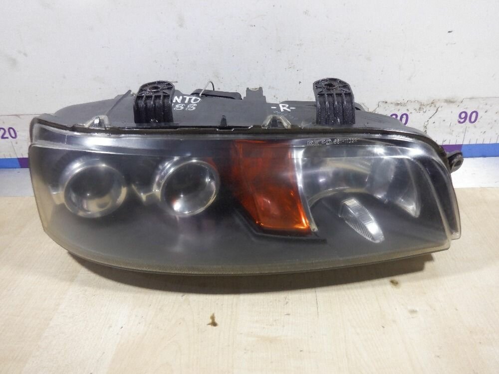 Фара правая Fiat Punto 6611132RLDEM