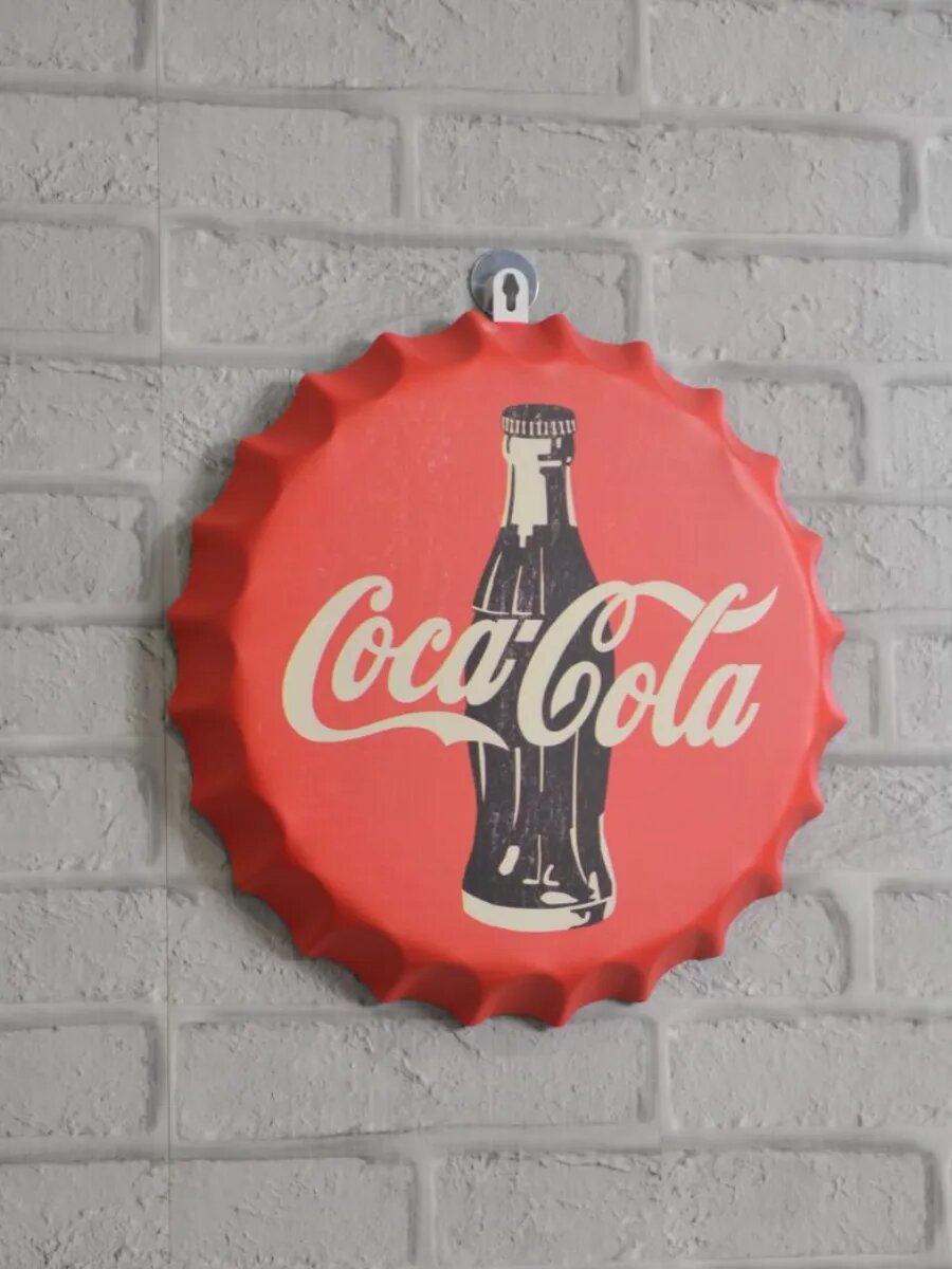 Панно из металла в виде пивной крышки