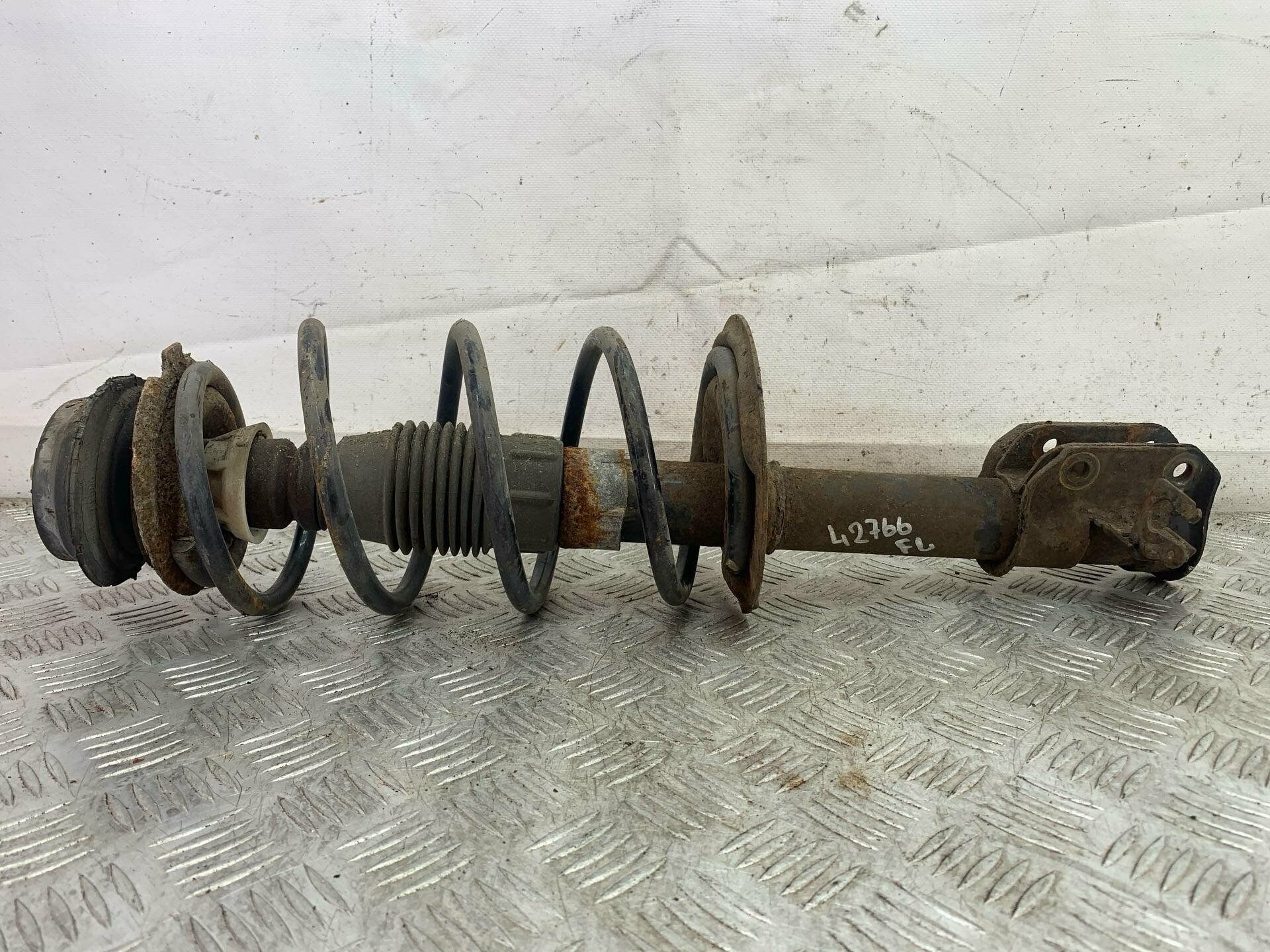 Стойка амортизатора передняя левая Fiat Punto 2 2001 00467464990E