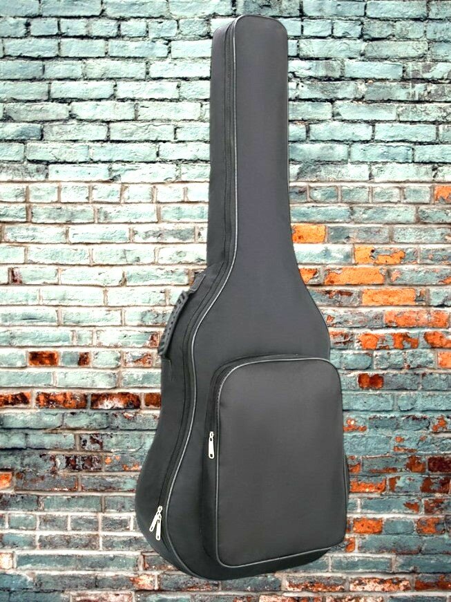 Чехол премиум класса для акустической гитары от 38 до 41 дюйма и гитары классической от 3/4 до 4/4. Чехол утепленный (10мм). С удлиненным накладным карманом. Ткань повышенной плотности Oxford.