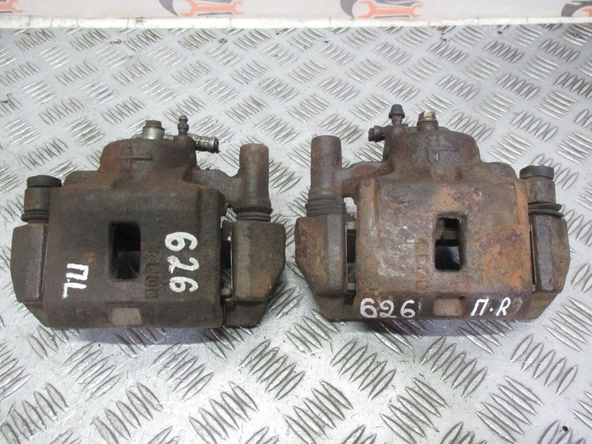 Суппорт передний Mazda 626 GE 1992-1997