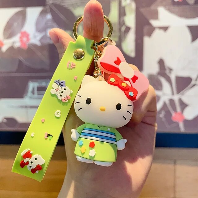 Миниатюрный брелок Hello Kitty — изысканный декоративный кулон в виде мультяшной героини, идеально подходящий для украшения рюкзаков, сумок и брелоков.