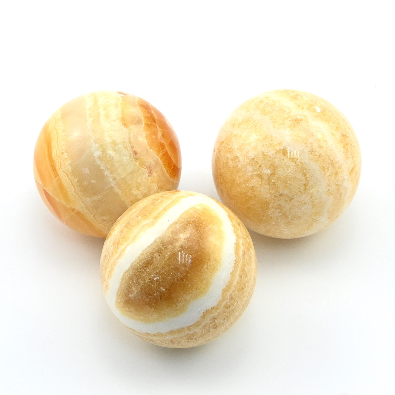 Шар из природного камня оникса (желтый), диаметр 62-63мм .