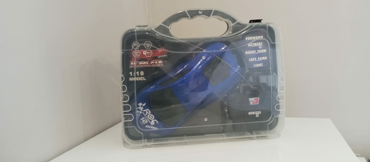 Машинка на пульте управление в чемодане, цвет синий, 1:18