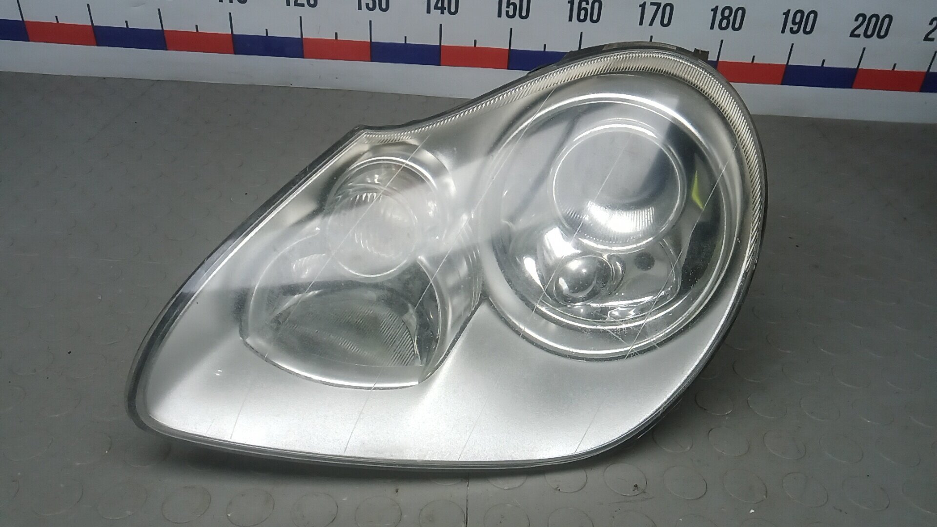 Фара левая PORSCHE CAYENNE 1