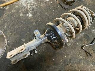 Стойка амортизатора Kia Spectra 1.6 S6D 2006 перед. лев. (б/у)