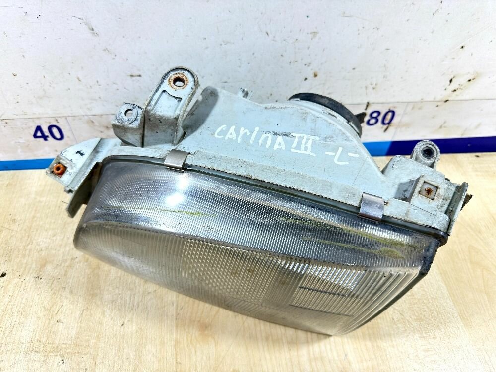 Фара левая Toyota Carina